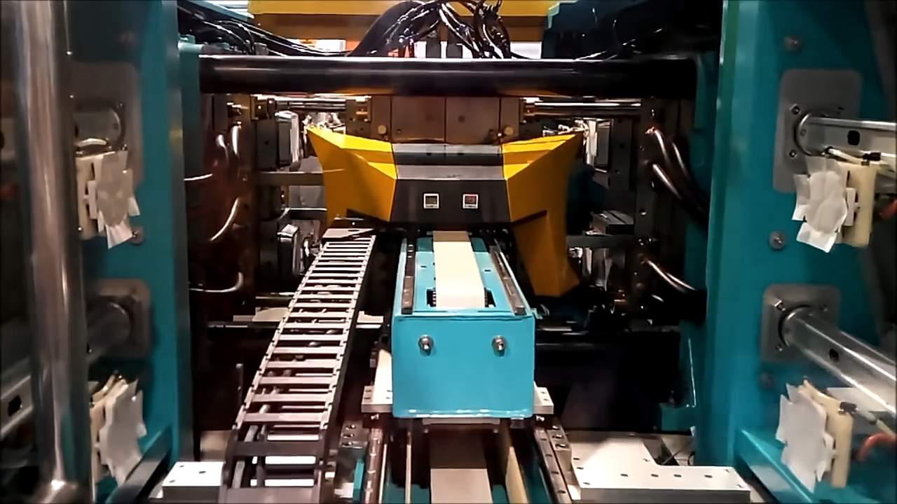 In-Mold Labeling Robots - We-Technology Automation In-Mold Labeling Robots - We-Technology Automation